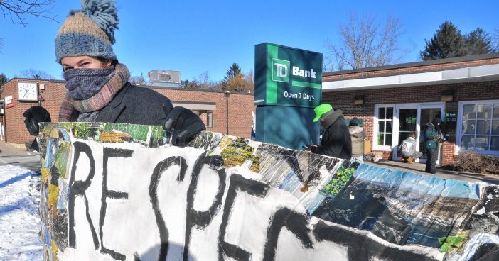 Four DAPL protesters arrested in Amherst after chaining themselves to ...