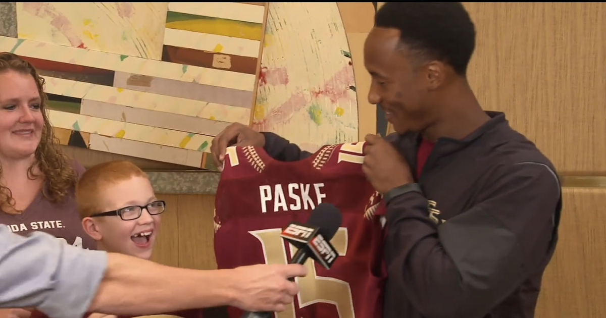 Travis Rudolph gives his jersey to lunch buddy
