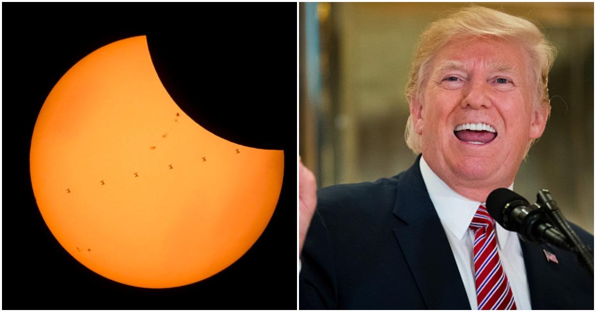 Here's a picture of Donald Trump staring defiantly at the eclipse ...